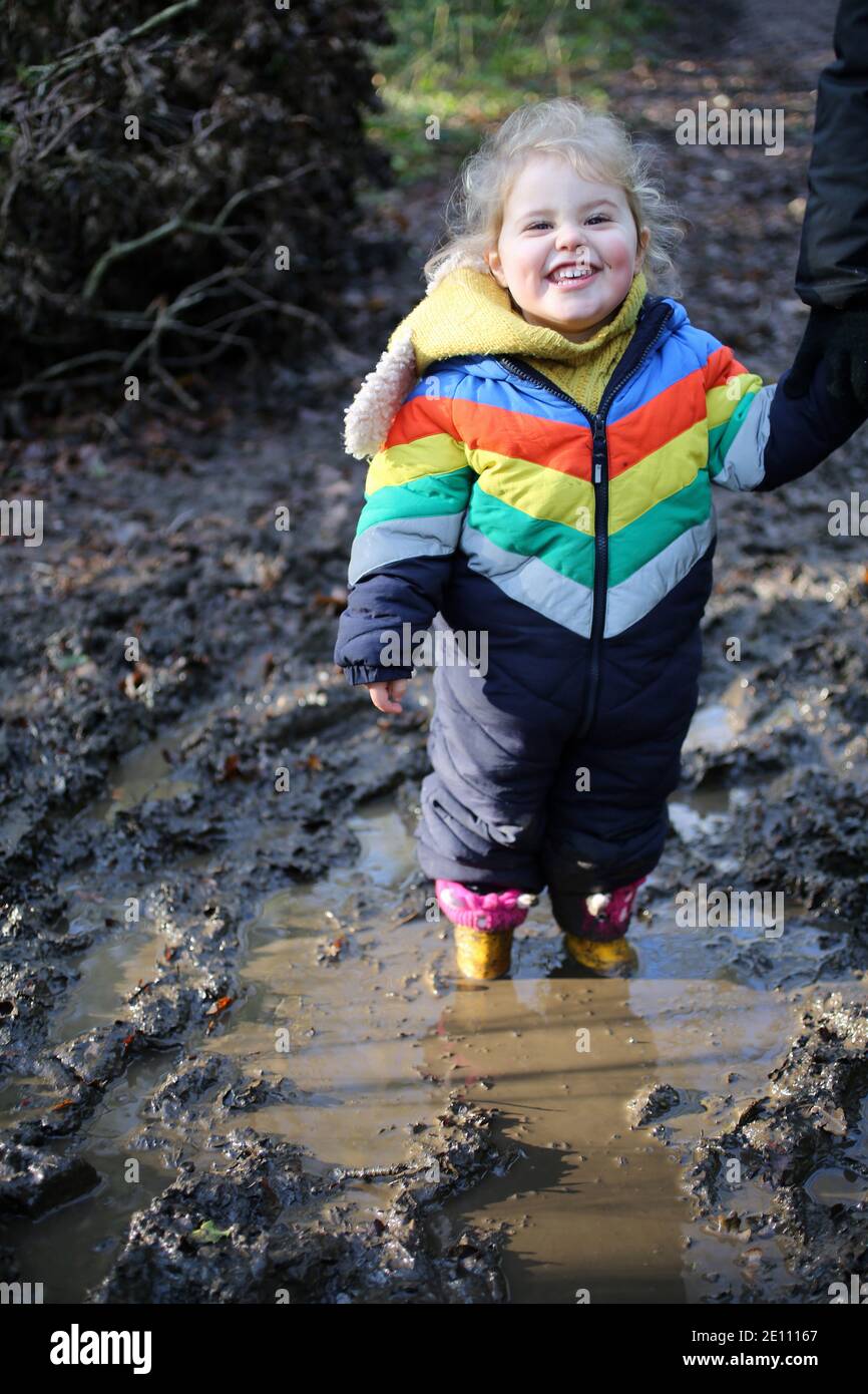 Kids walking in mud hi-res stock photography and images - Alamy