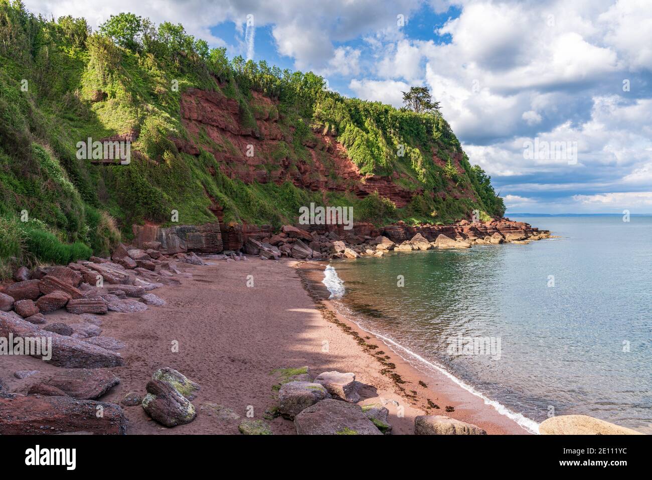 Clouds over the beach in Maidencombe, Torbay, England, UK Stock Photo ...