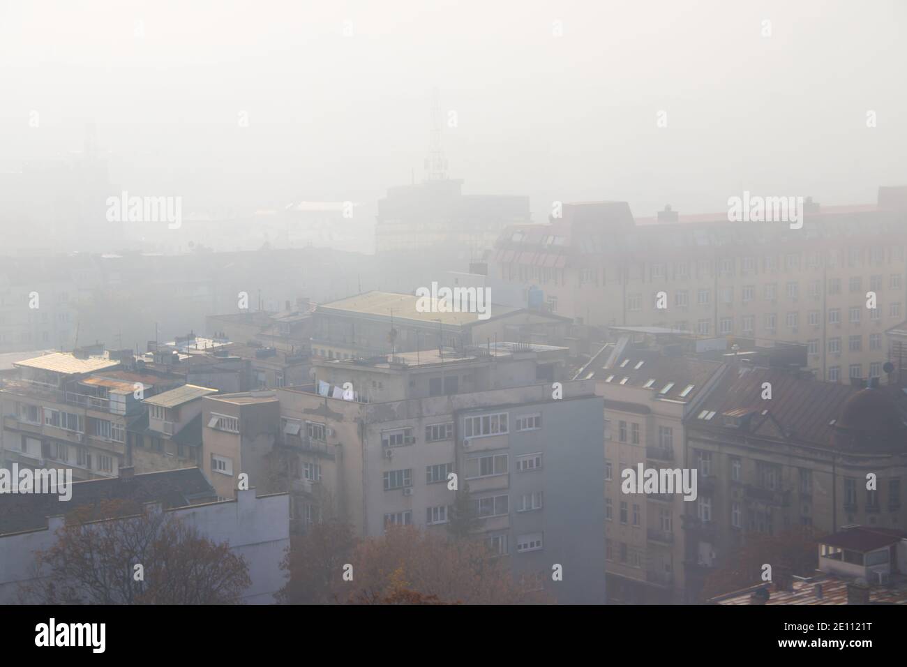 City pollution mixed with morning fog, Belgrade cityscape Stock Photo ...