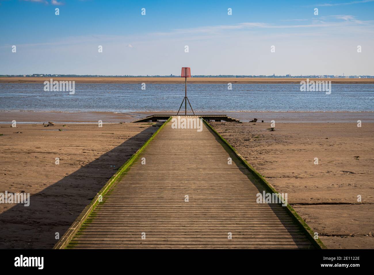 A wooden path leading to the shore of the River Ribble, seen in Lytham ...