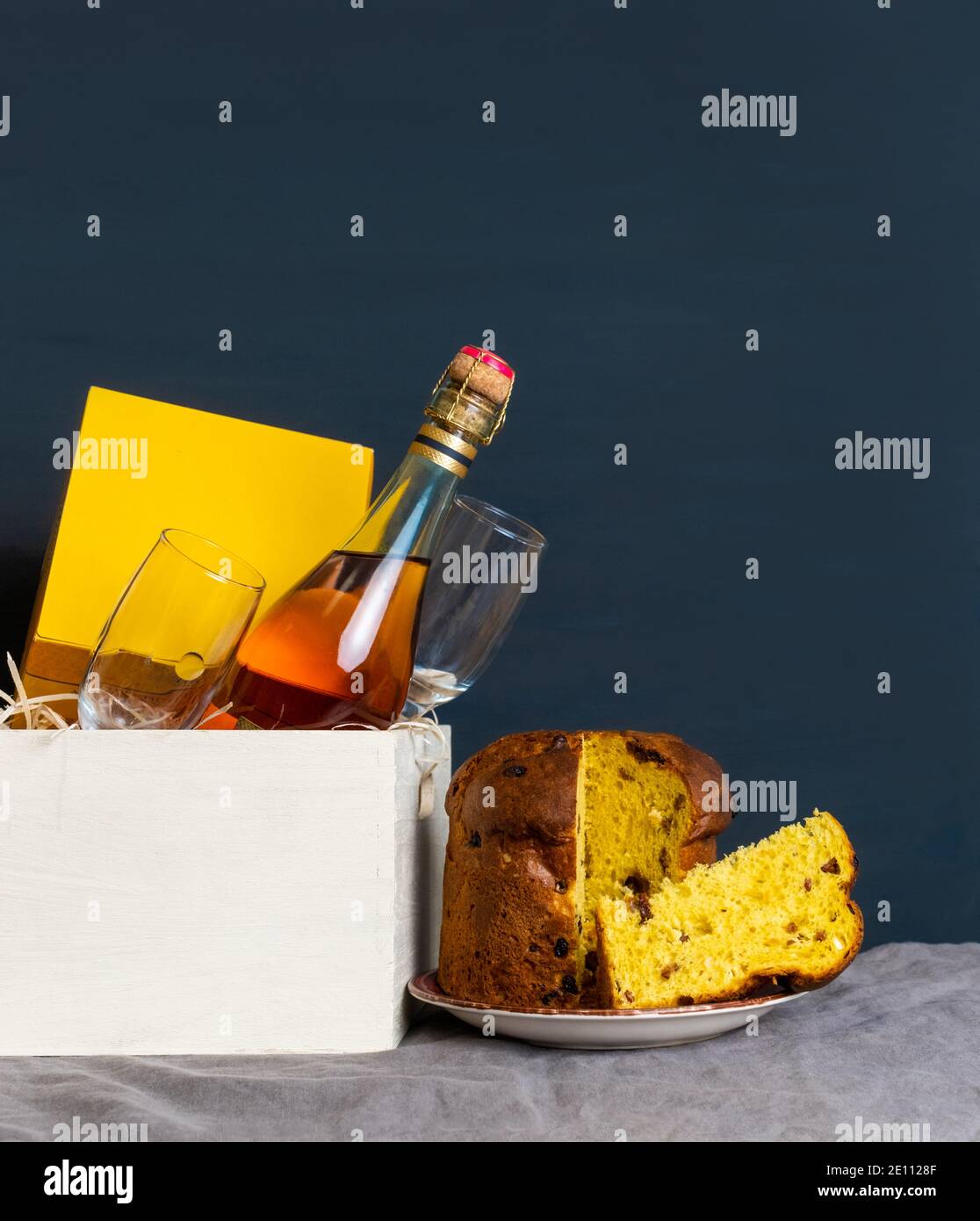 Easter panetone italian with champagne bottle and two glasses on the ...