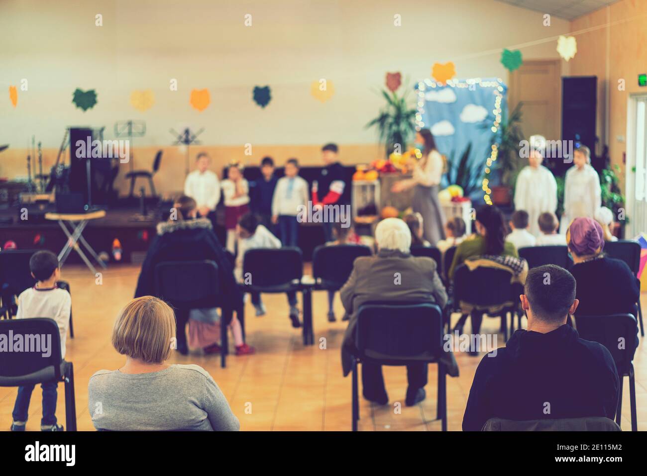 Parents at the performance of children in kindergarten or school ...