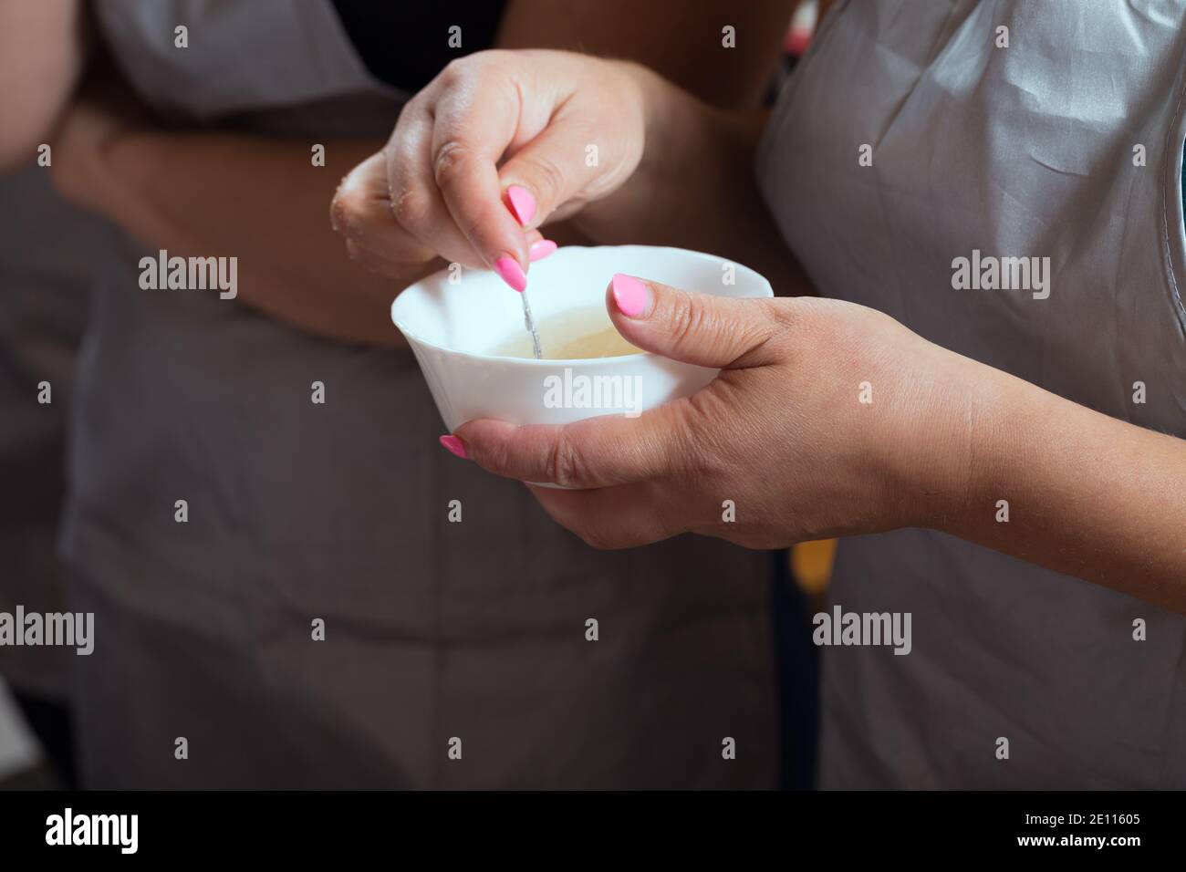 Hand mixing ingredients flour in hi-res stock photography and images ...