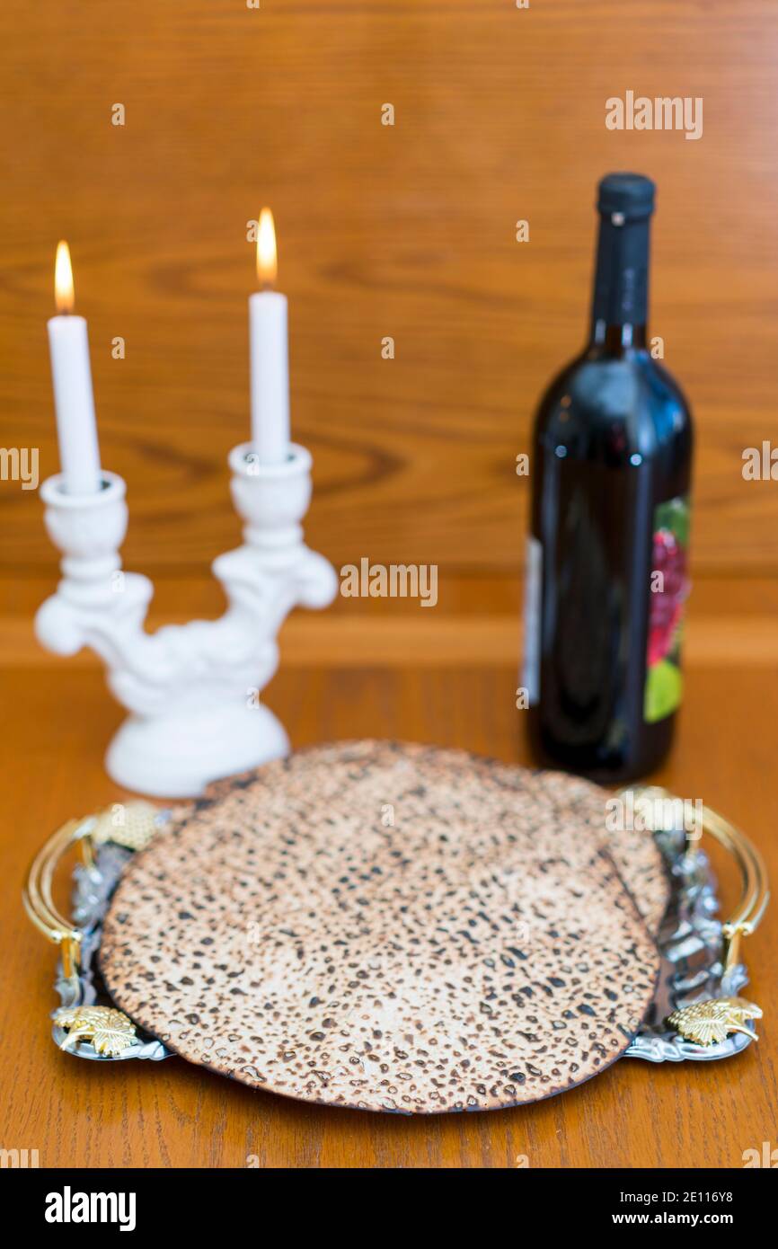 Corona Passover. Dust mask, bottle of wine and matzah - a traditional ...