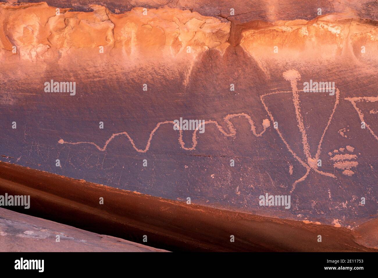 Native American Rock Art of men and a snake - Petroglyphs - on The ...