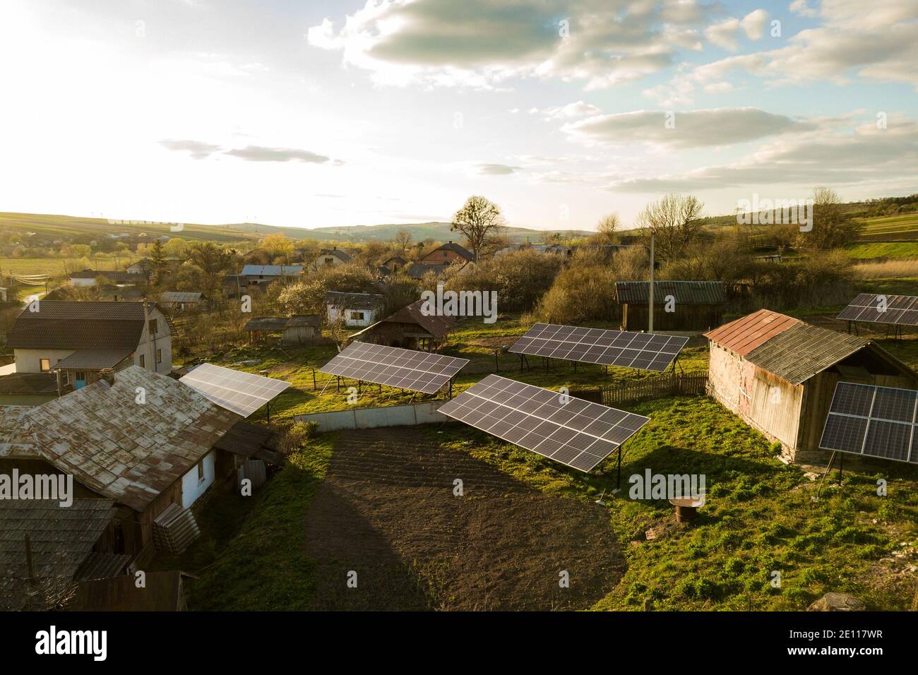 Aerial top down view of solar panels in green rural village yard Stock ...
