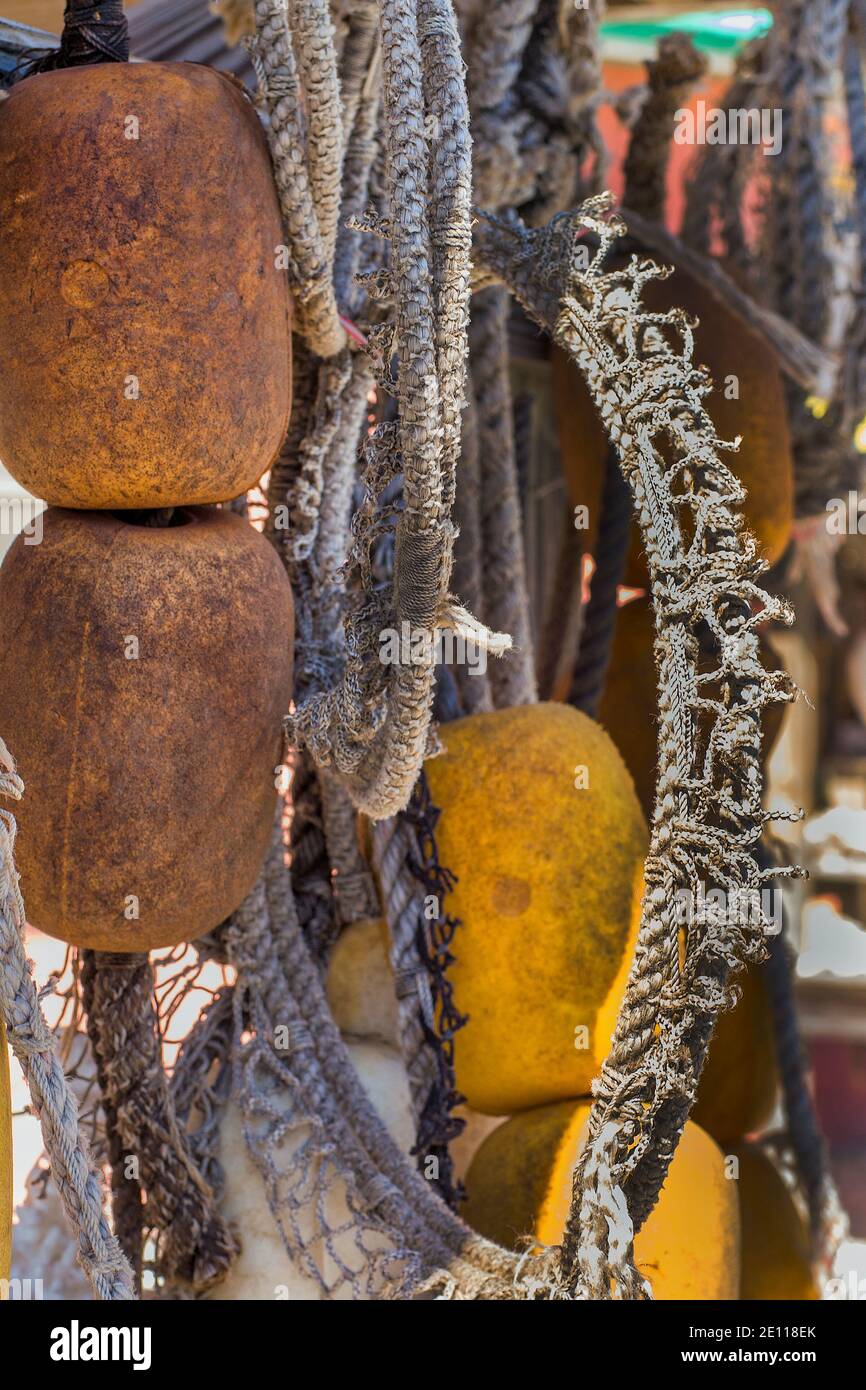 Old floats and rope hang outside a shop on Key Largo in the Florida ...