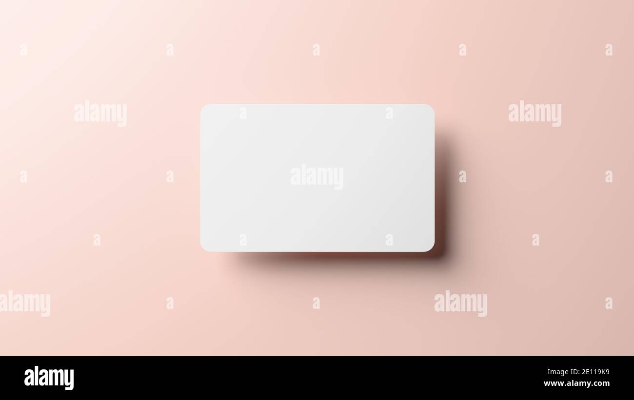 Blank credit card mockup floating over a neutral background in ...