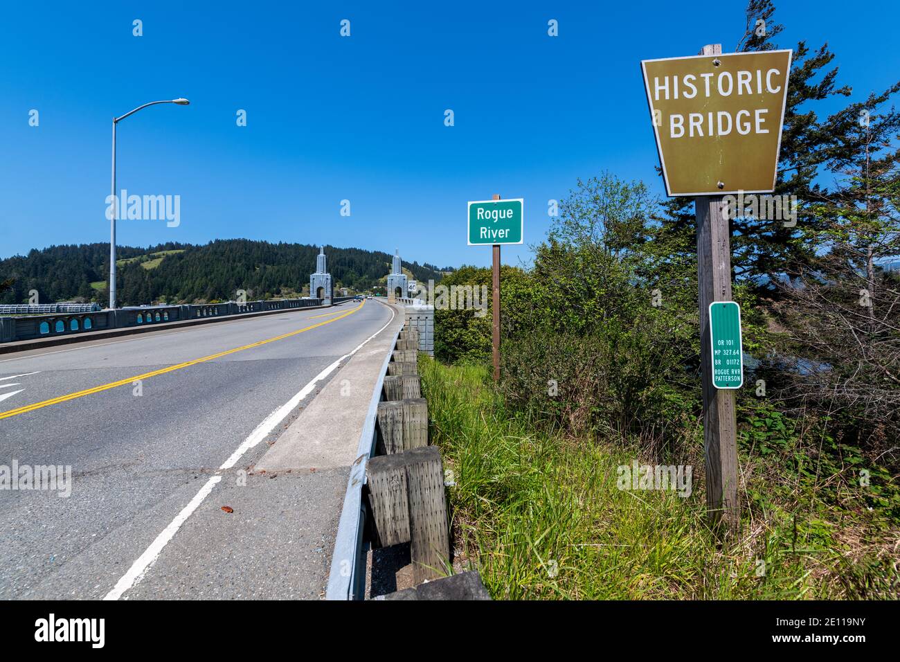 Signs and obelisks on the south end of the Rogue River Bridge in Gold ...