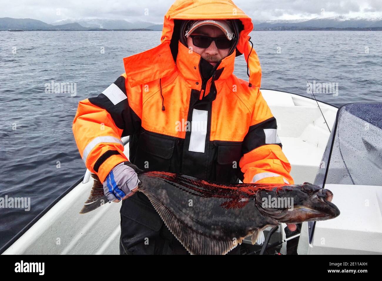Angler With Caught Halibut, Norway Stock Photo - Alamy