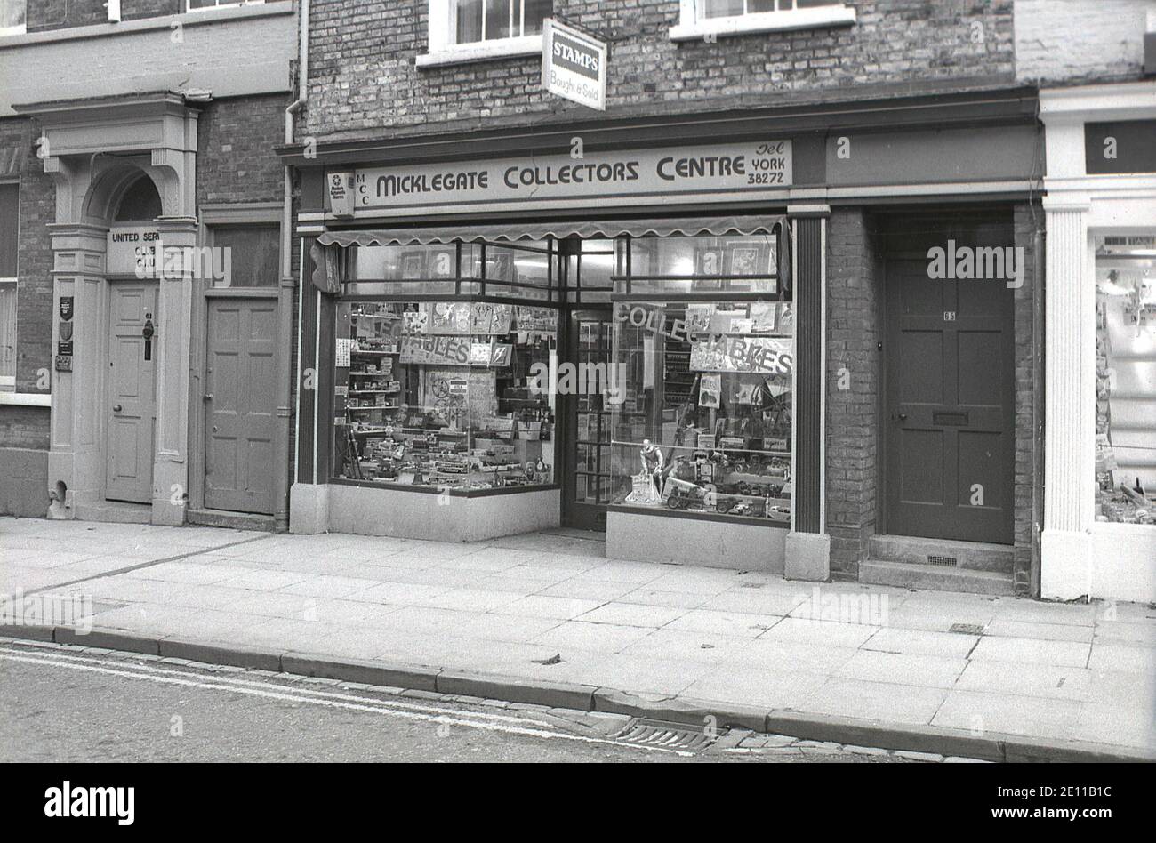 1980s, shop window of a high-street retail store, traditional in style ...