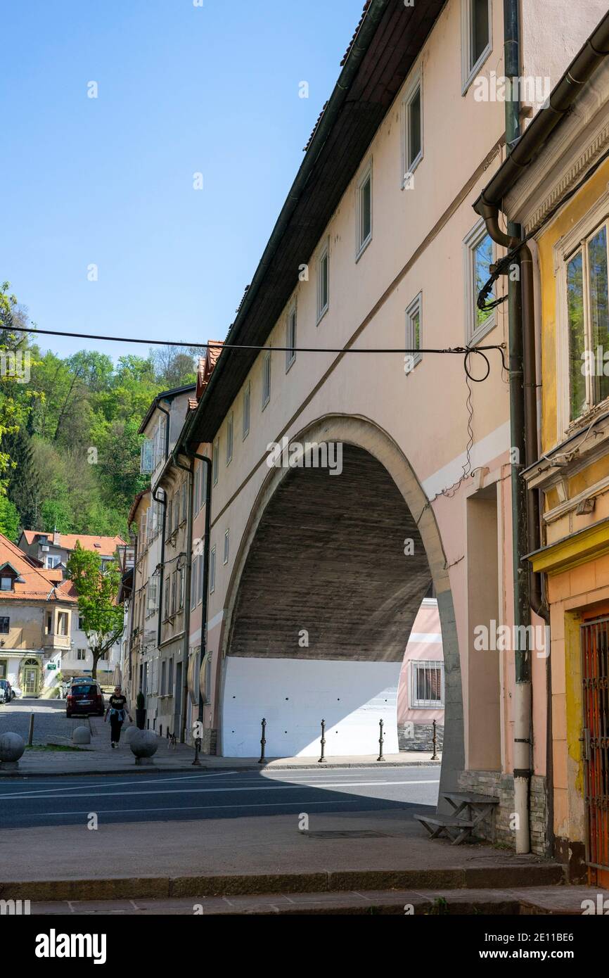 Building made as an arch over a street Stock Photo - Alamy