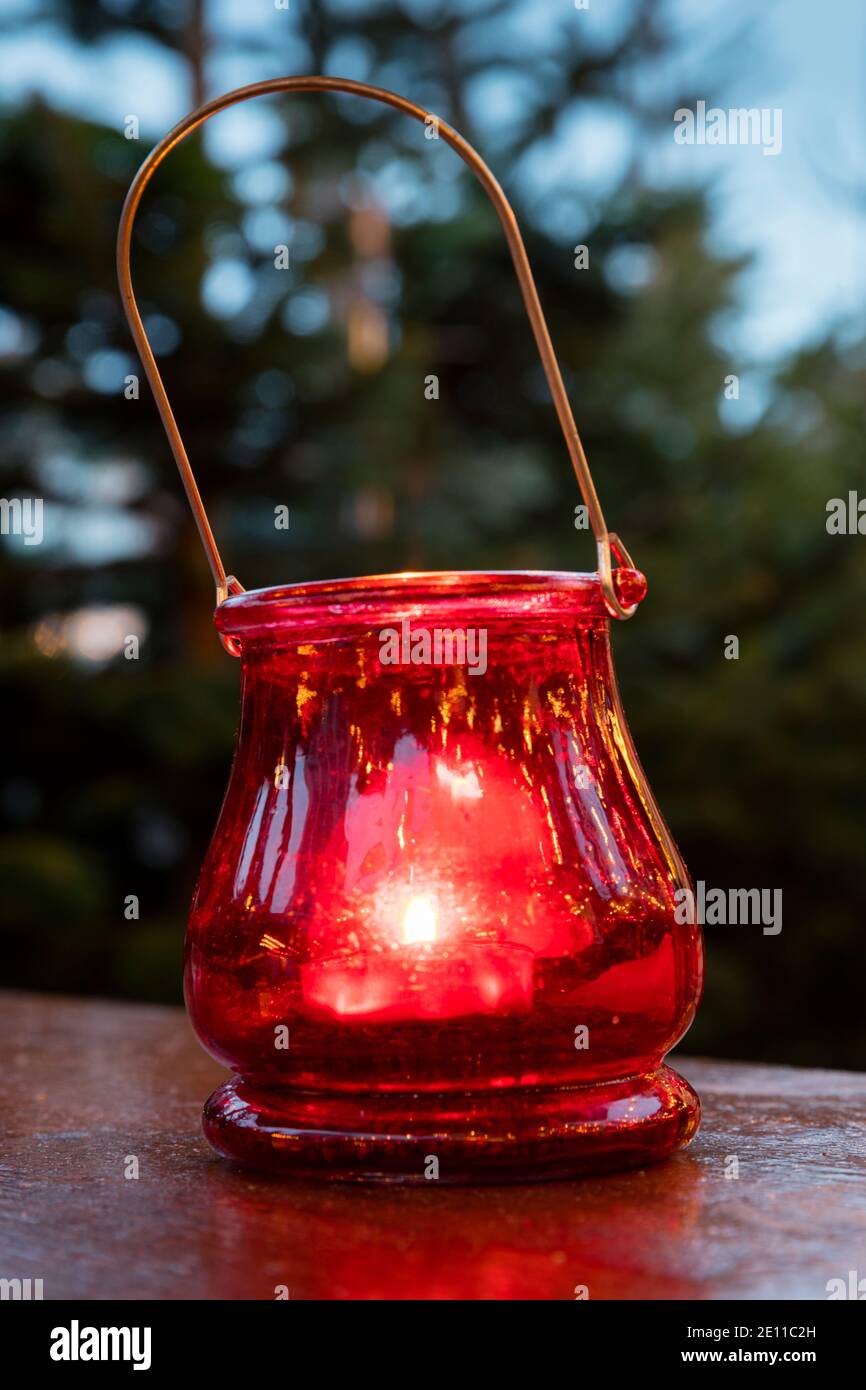Glass With Candle Stock Photo - Alamy