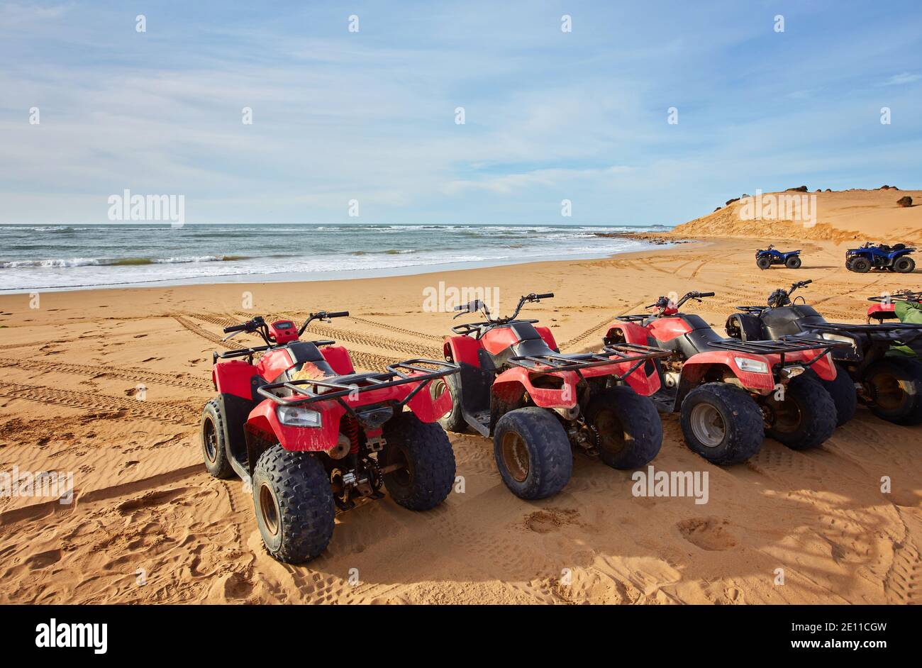 Several ATVs on the sandy beach of the Atlantic Ocean Stock Photo - Alamy