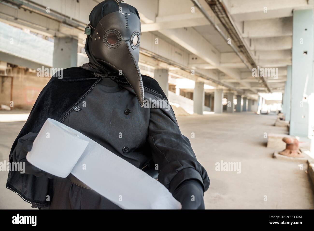 plague doctor in an empty city on an empty marina Stock Photo - Alamy
