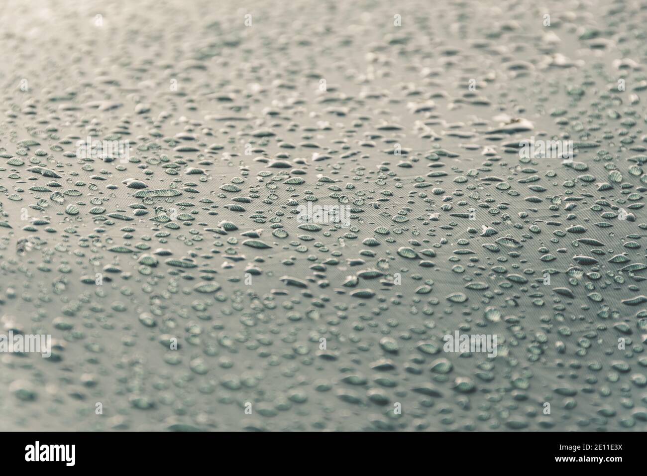 Water drops on smooth surface of waterproof fabric Stock Photo - Alamy