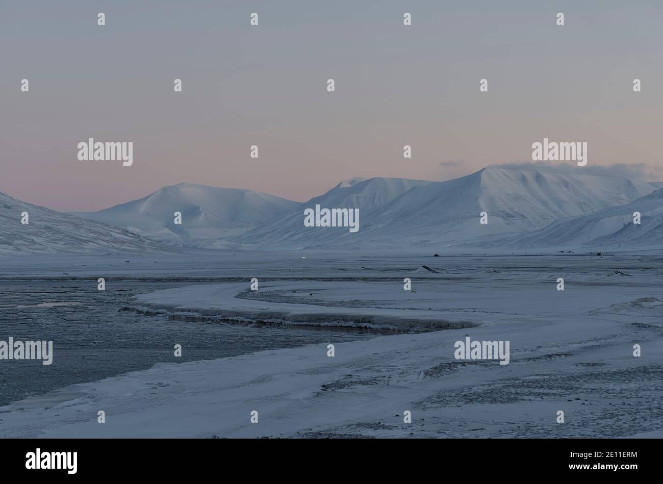 Dark winter season on Svalbard. Twilight on the moutains in Adventdalen ...
