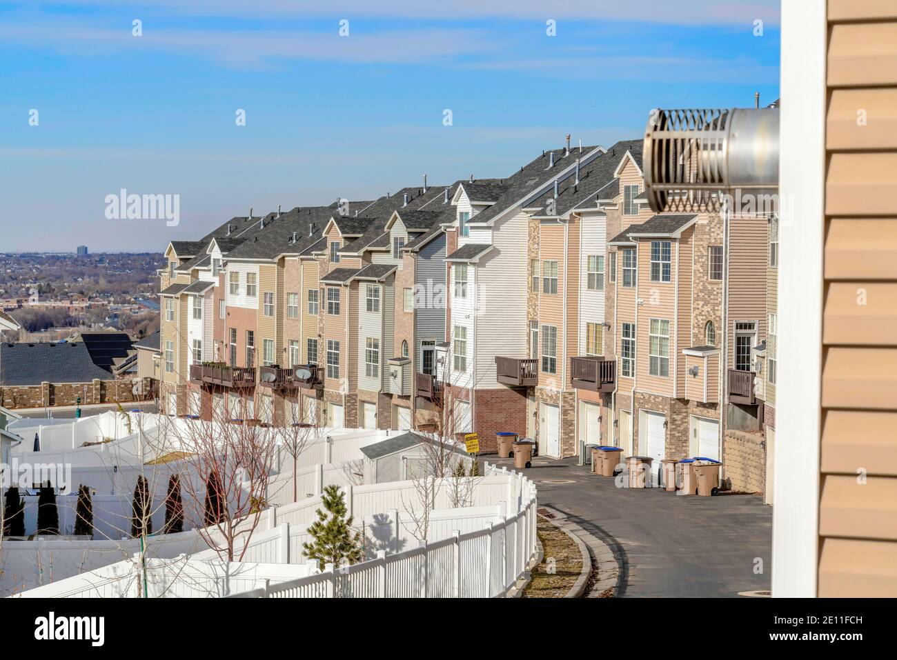 Utah Valley scenic neighborhood with townhouses against blue sky ...