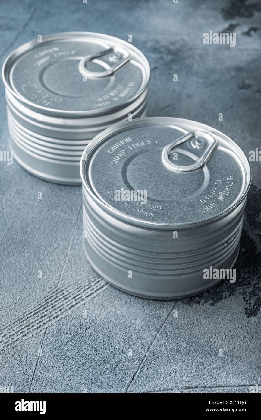 Canned dip tin can, on gray background Stock Photo - Alamy
