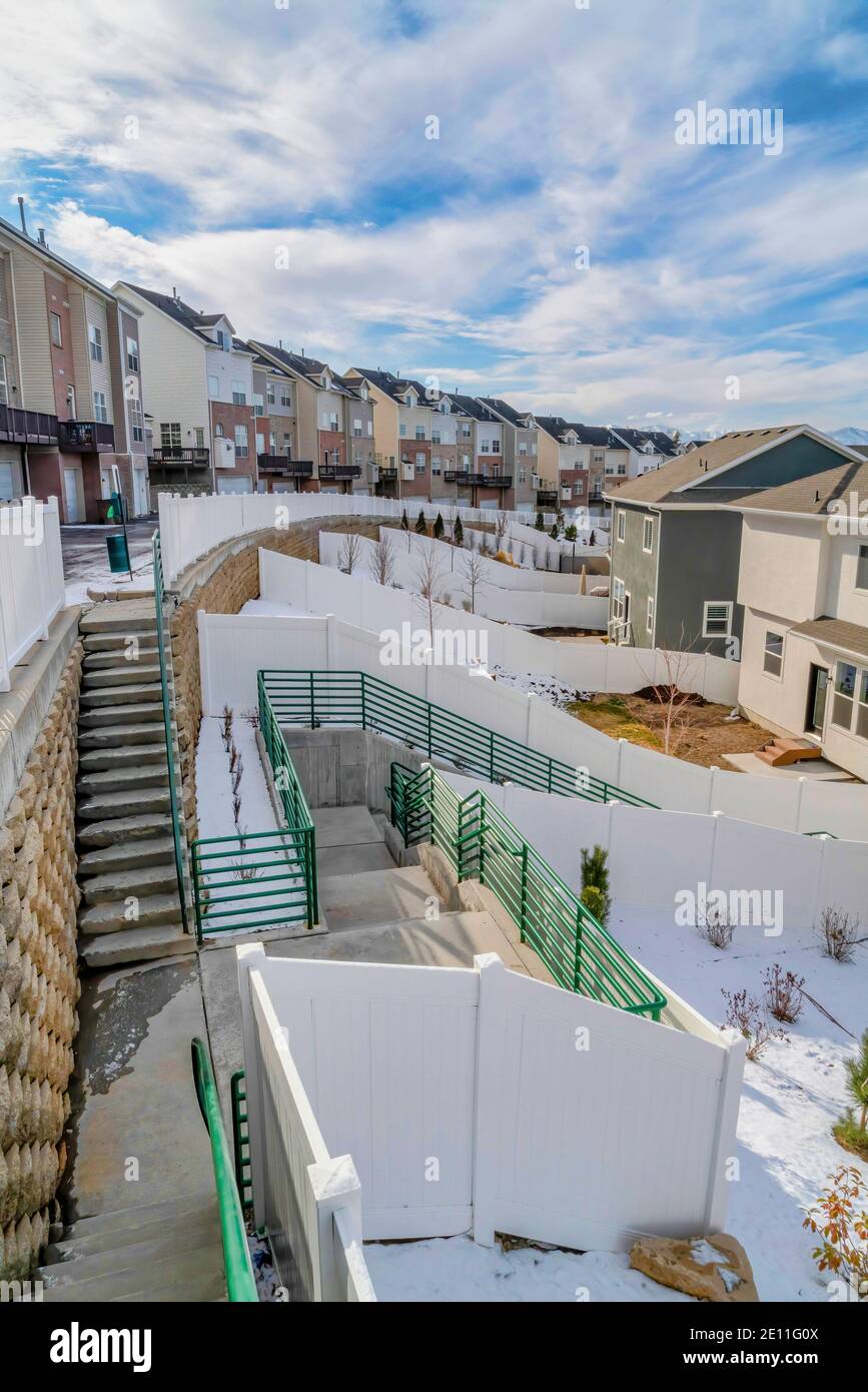Aerial view of houses in the neighborhood with outdoor stairs and ...