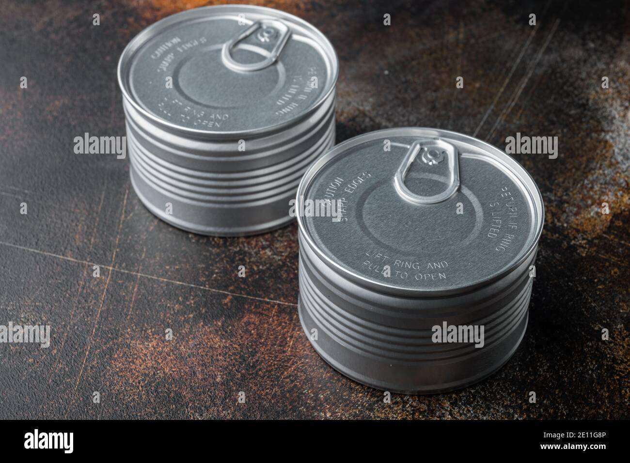 Canned dip tin can, on old dark rustic background Stock Photo - Alamy
