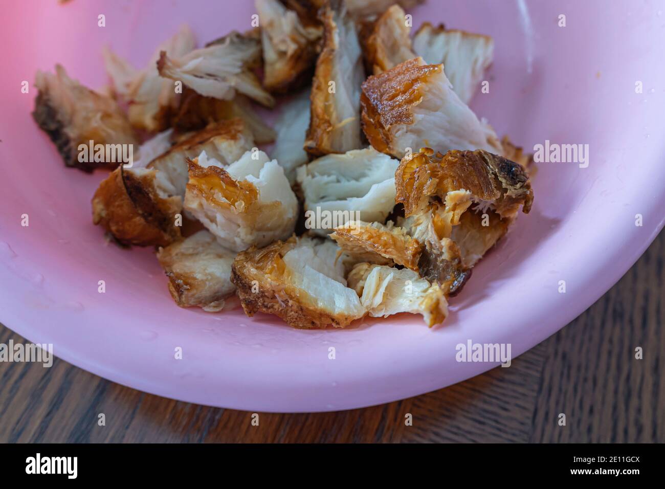 A bowl of Nigerian Fried fish to make a traditional Nigerian meal Stock ...