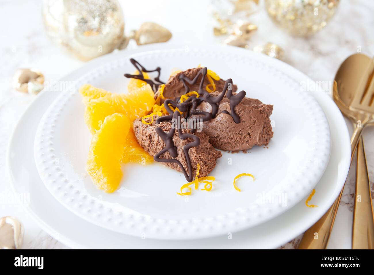 Delicious Chocolate Mousse With Orange Slices Stock Photo - Alamy