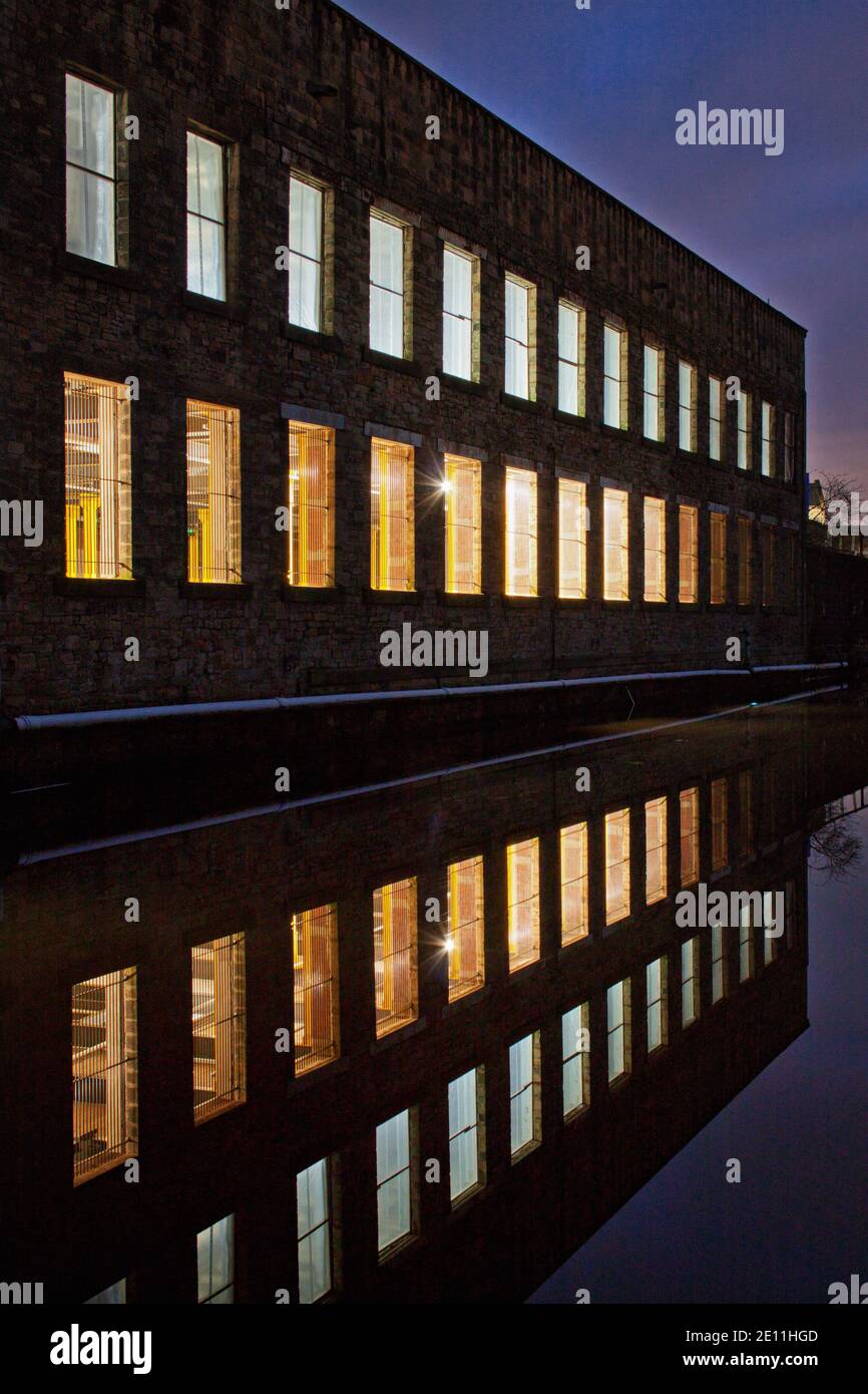 A section of an old mill, under renovation, in portrait format, with ...