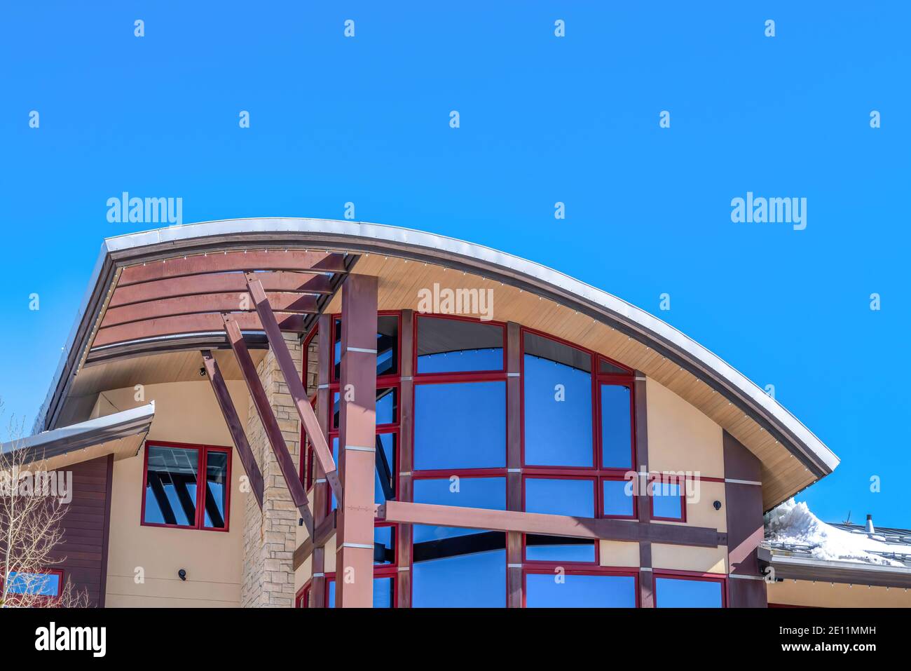 Contemporary Home Curved Roof Exterior Design