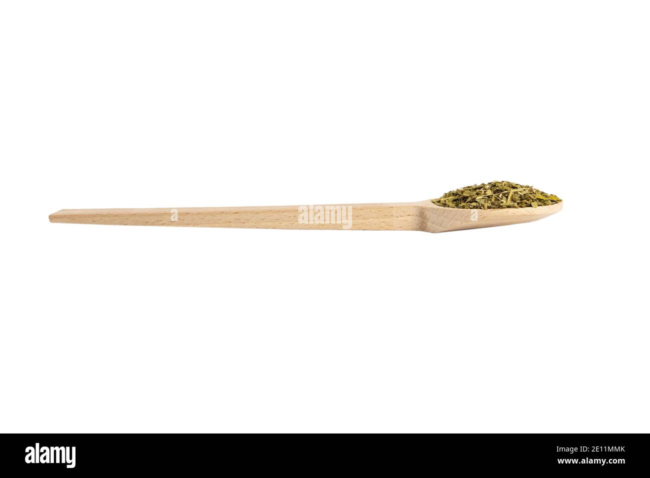 Dried leaves of yerba mate tea on wooden spoon isolated on white ...