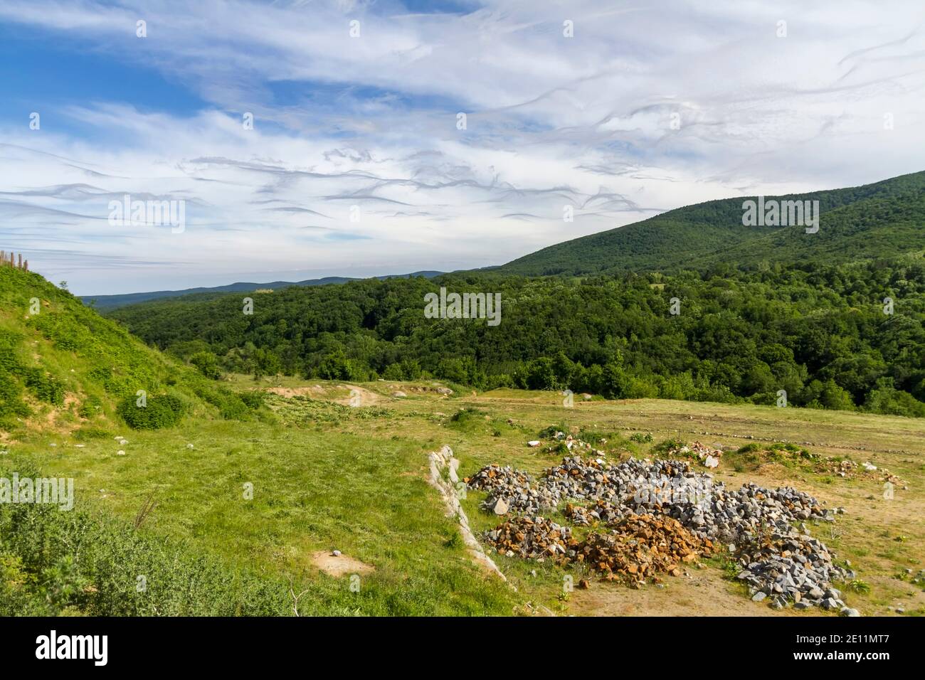 Different clouds in the blue sky and house of mountain in Turkey Stock ...