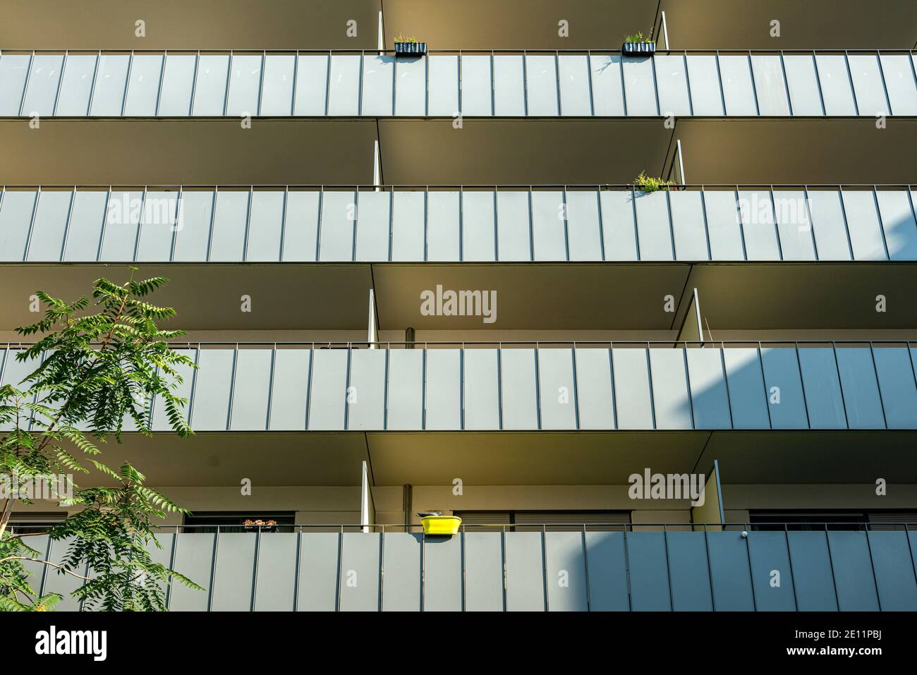 Row Of Balconies In Social Housing Stock Photo - Alamy