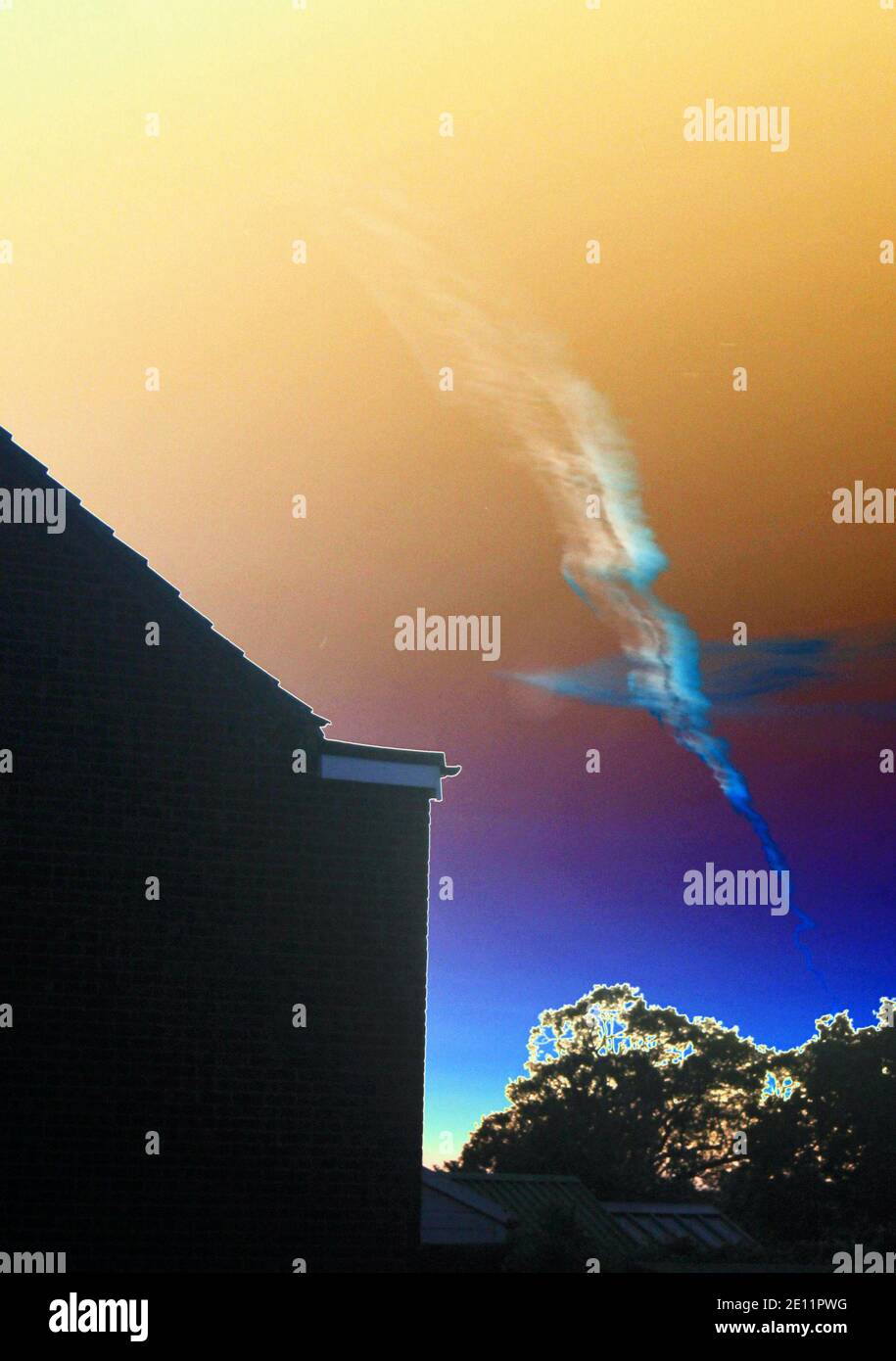 Solarised image of unusual cloud formation Stock Photo - Alamy