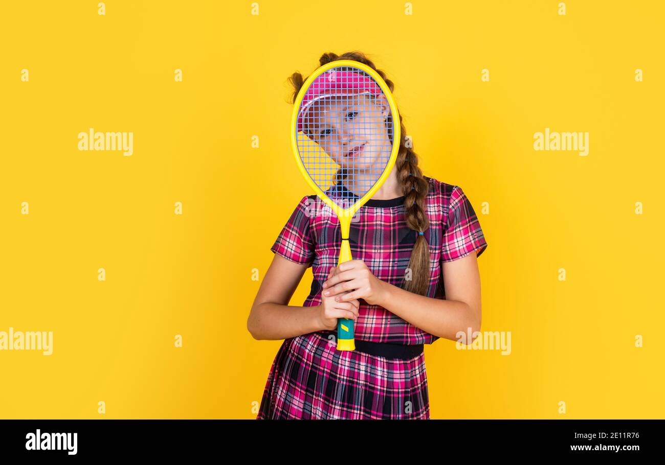 Relaxing after training. happy girl holding sport equipment. kid hold ...