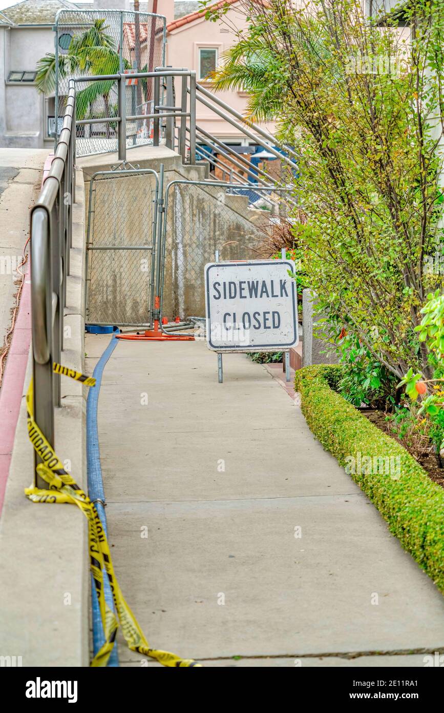 Sidewalk closed sign on a pathway under construction in Long Beach ...