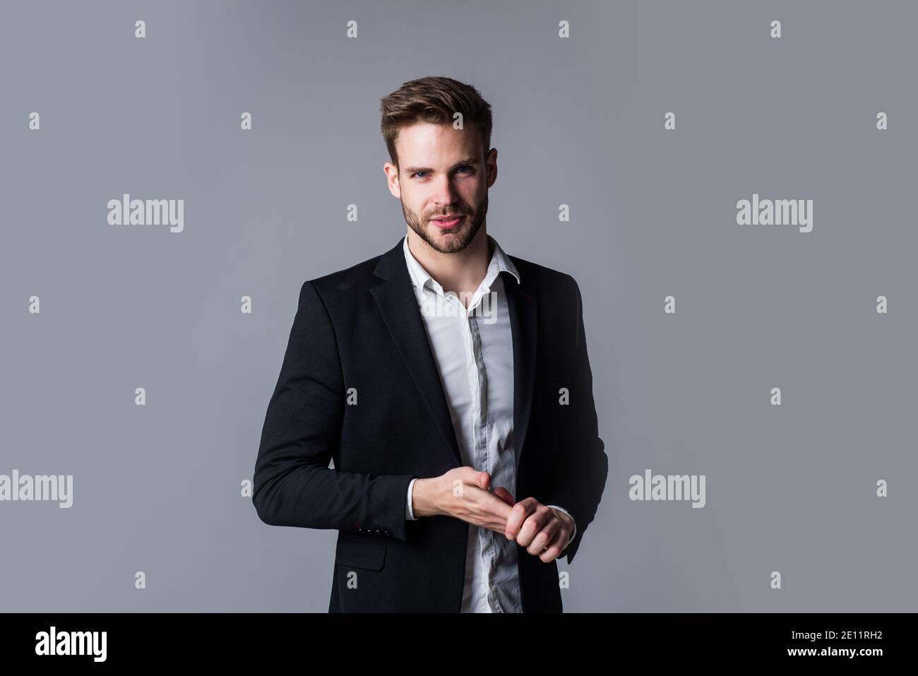 male with fashionable groomed hair and beard, employee Stock Photo - Alamy