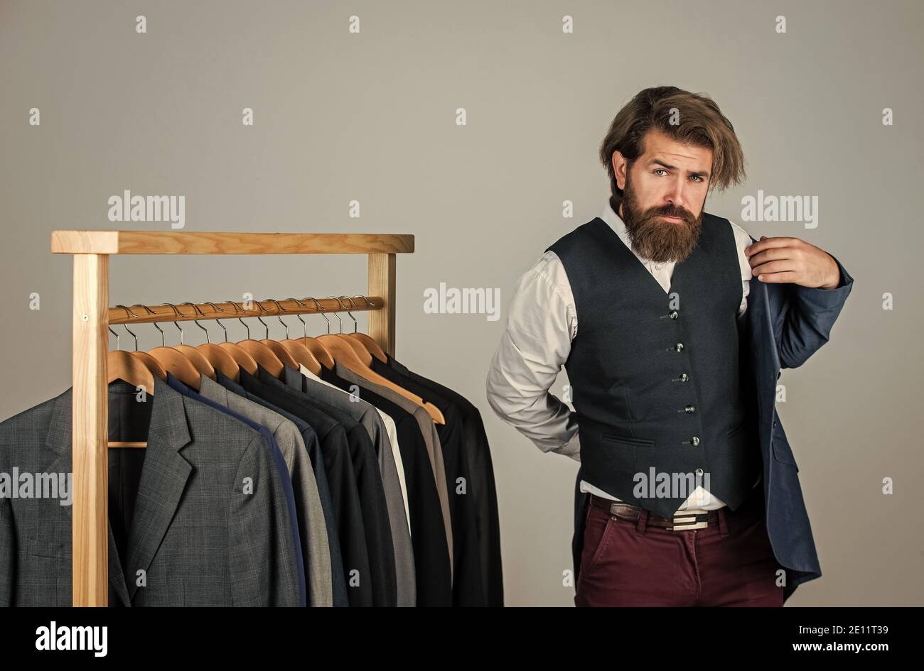 Perfect design. Man in boutique. Man with suit. tailor in his workshop ...