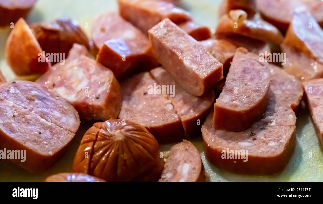 Close up View at Fully Cooked Sausage sliced and Diced Stock Photo - Alamy