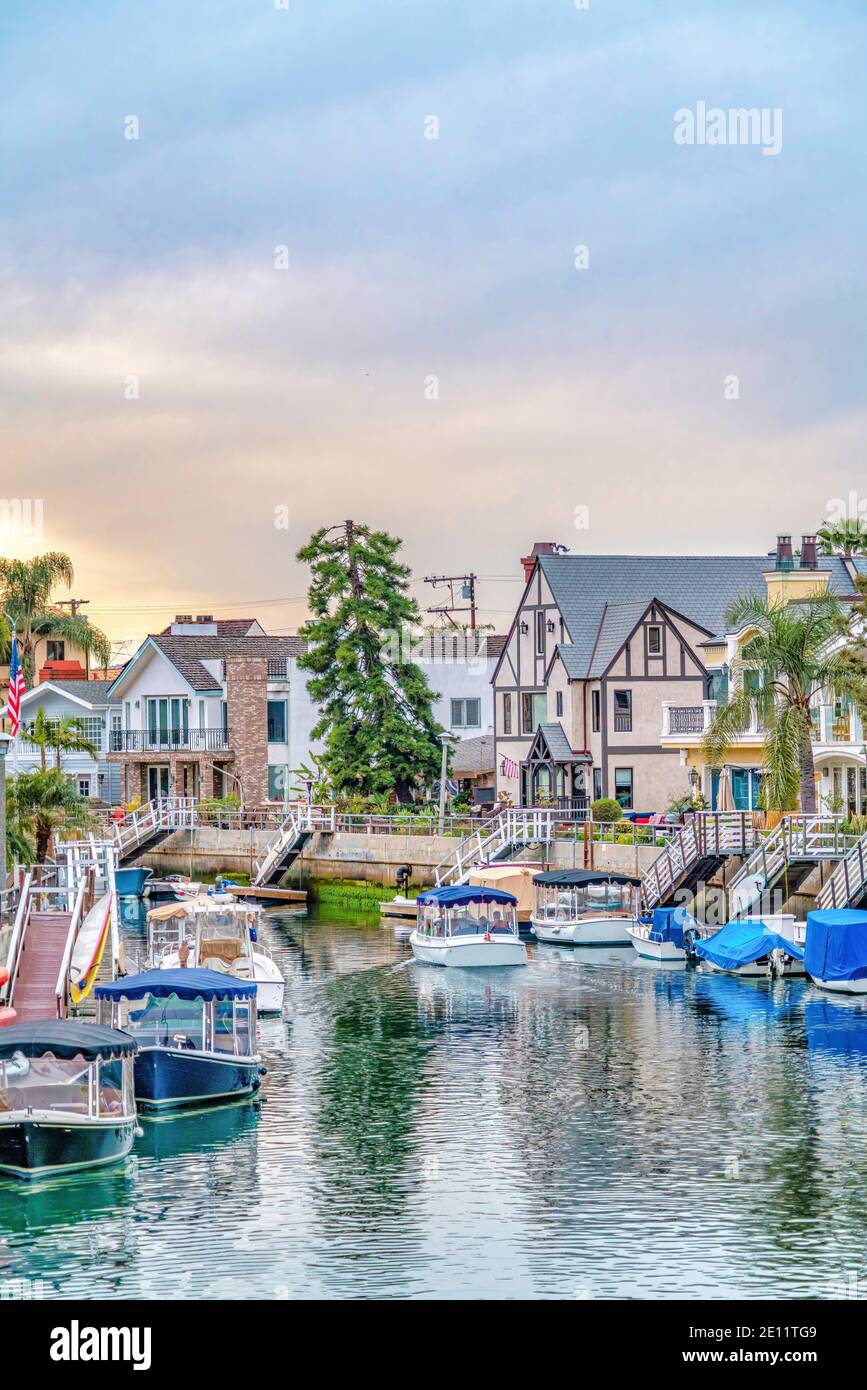 Amazing canal scenery with boats and waterfront homes in Long Beach ...