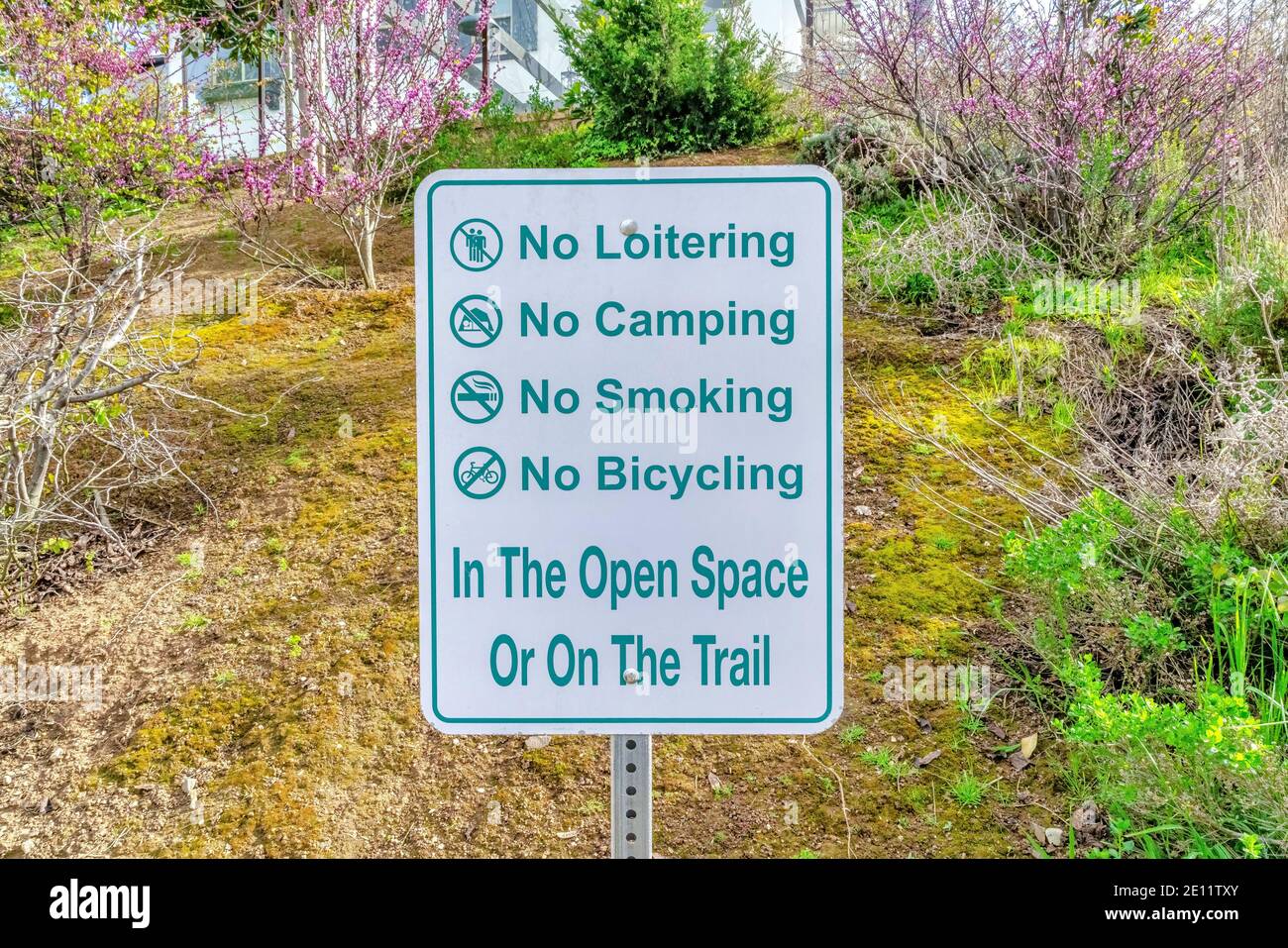 Prohibition sign on a grassy open space and trail in Huntington Beach ...