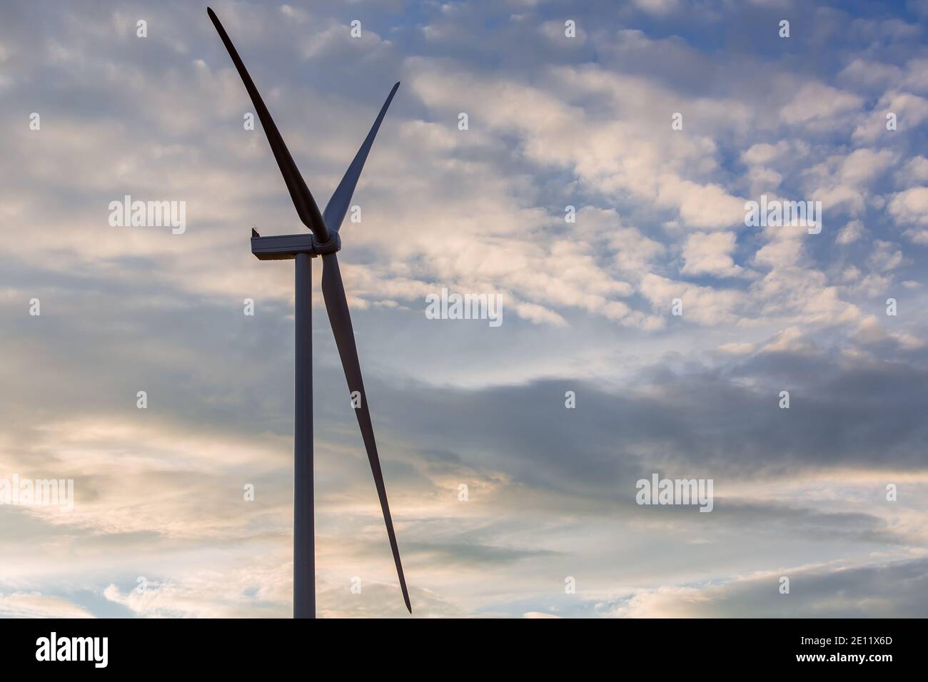 wind turbine offshore windmill of white color made of iron with blades ...