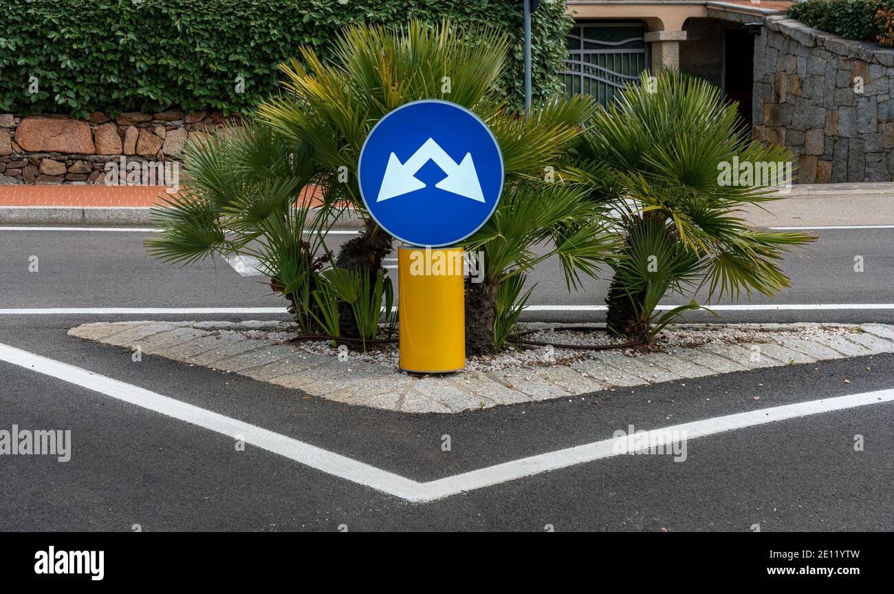 Traffic Sign For Driving Past A Central Island Stock Photo - Alamy