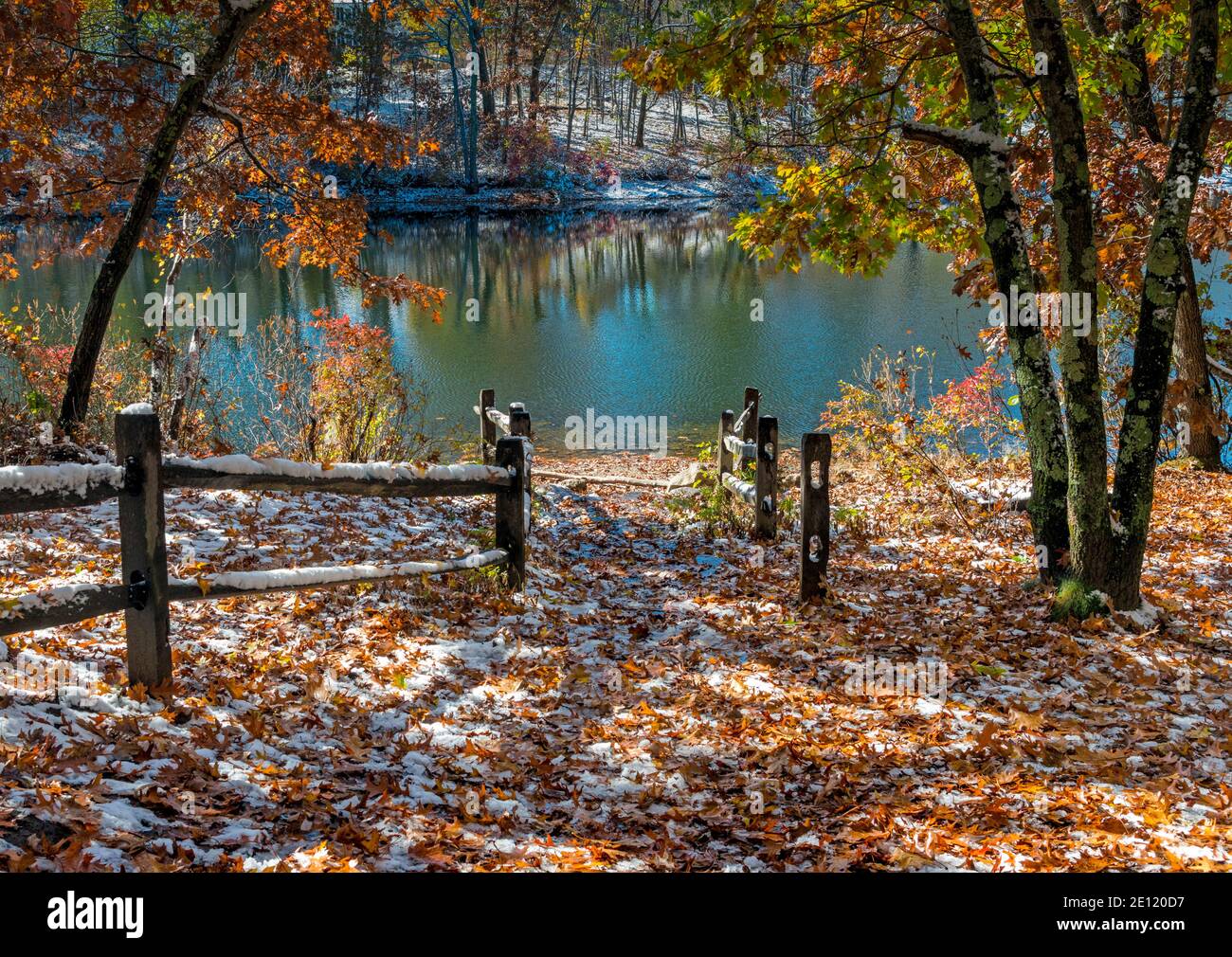 Foliage and snow scene along the banks of Lake Cochichewick, town ...