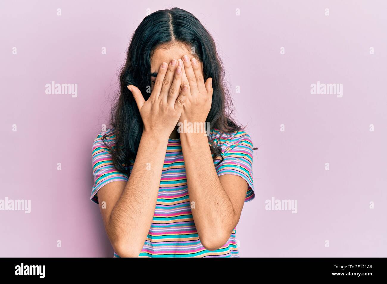 Hispanic teenager girl with dental braces wearing casual clothes with ...