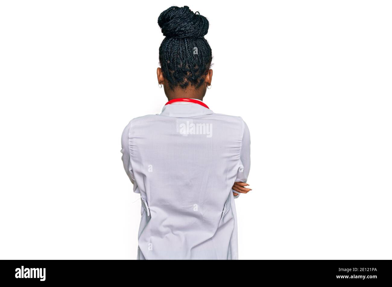 Young african american woman wearing doctor uniform and stethoscope ...