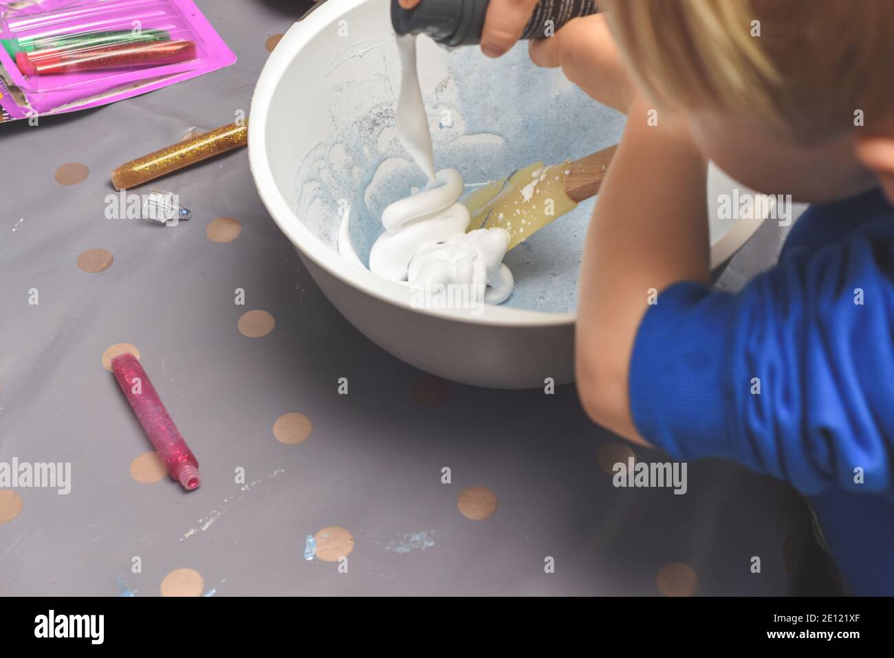 Kids activity of making slime as a science experiment for children to ...