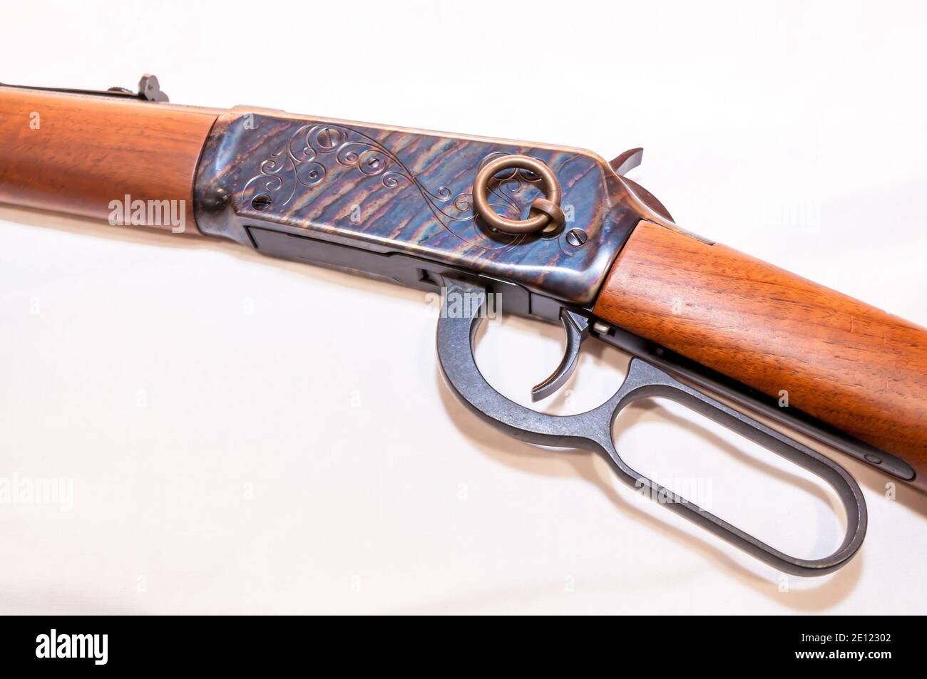 A lever action 30-30 caliber hunting rifle with a saddle ring attached ...