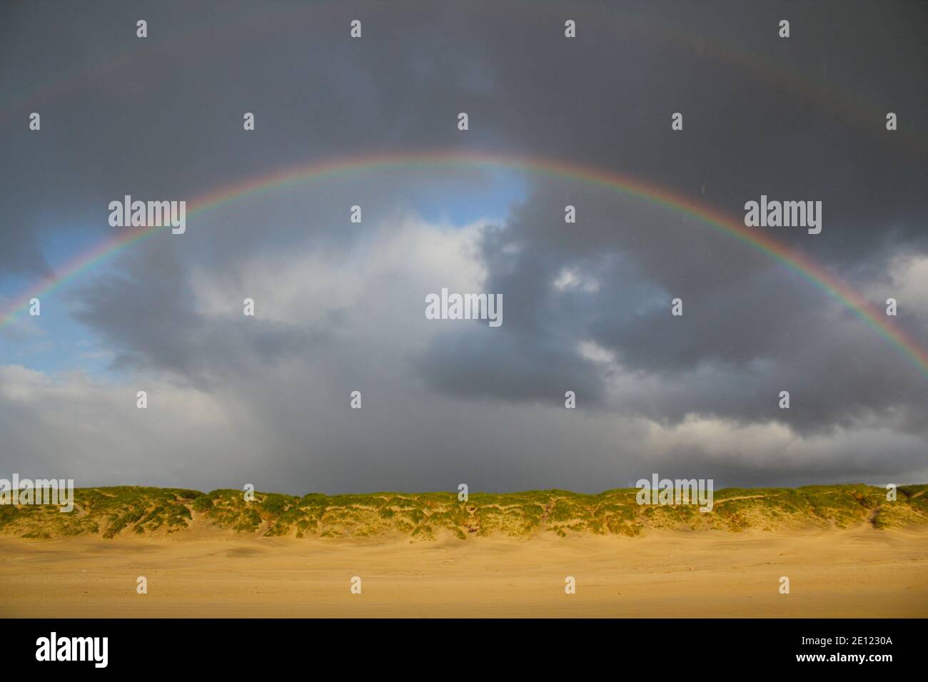 Rainbow Above The Dunes Of Denmark Stock Photo - Alamy