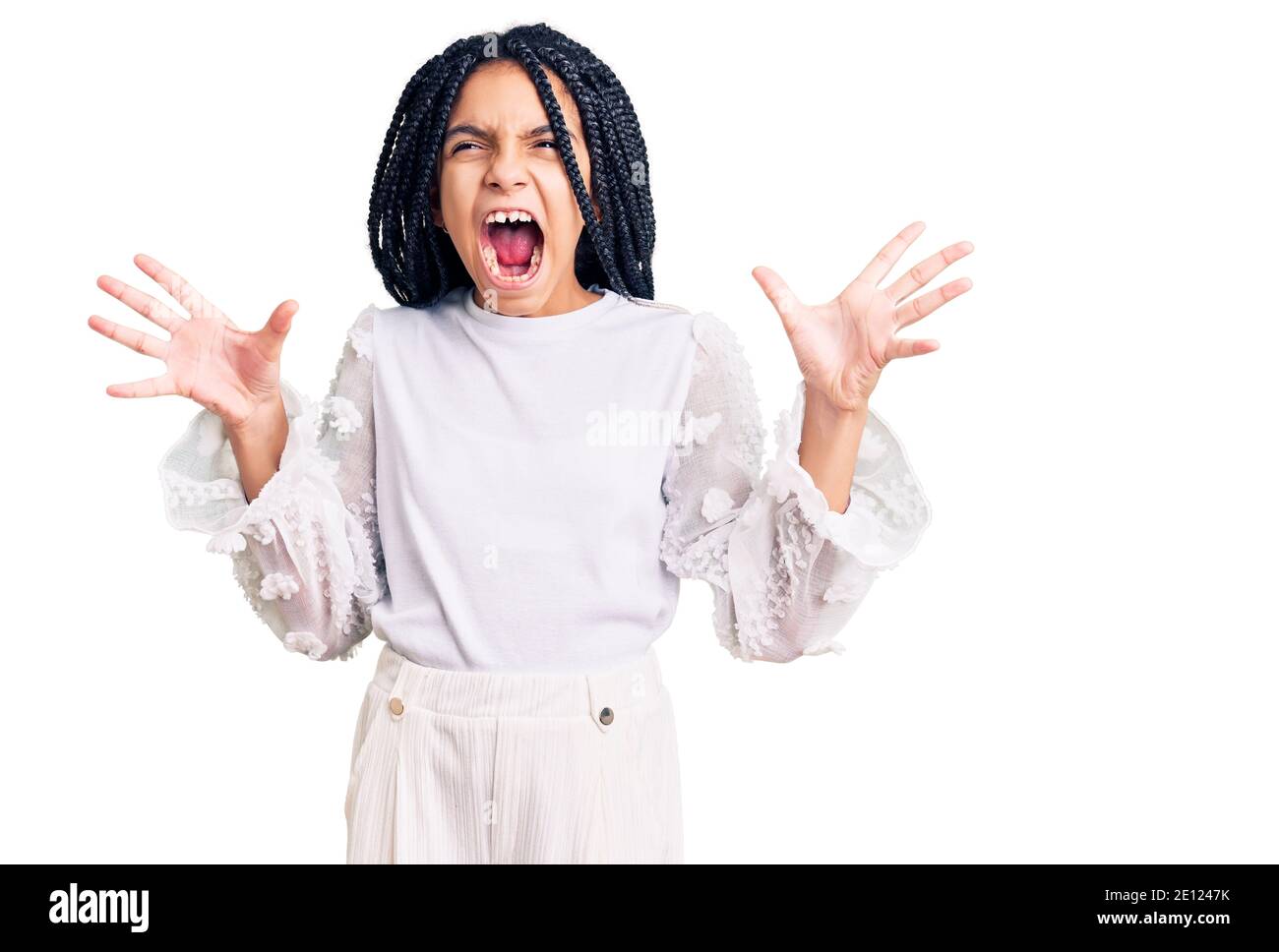 Cute african american girl wearing casual white tshirt crazy and mad ...