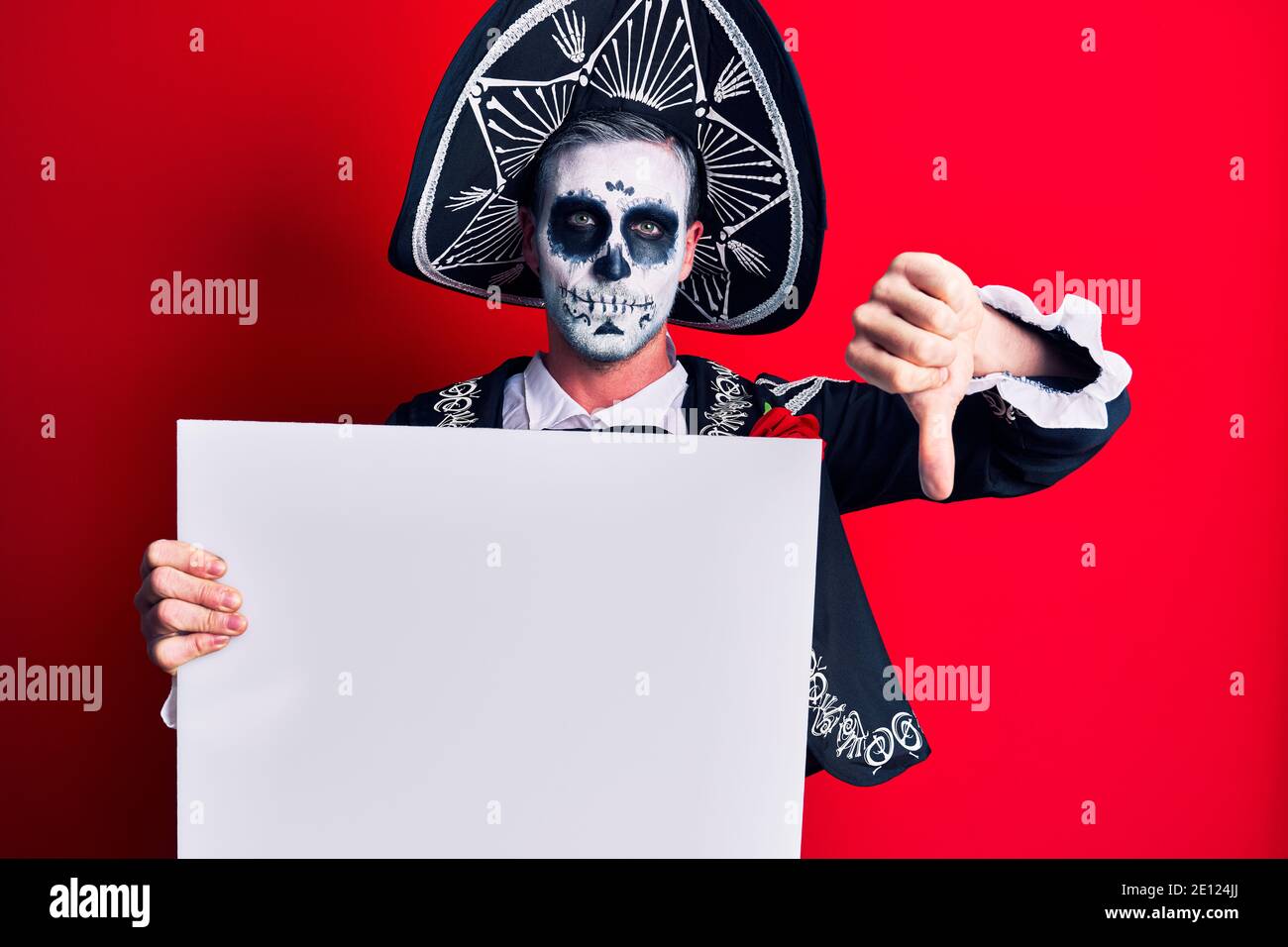 Skull sad unhappy face holding hi-res stock photography and images - Alamy